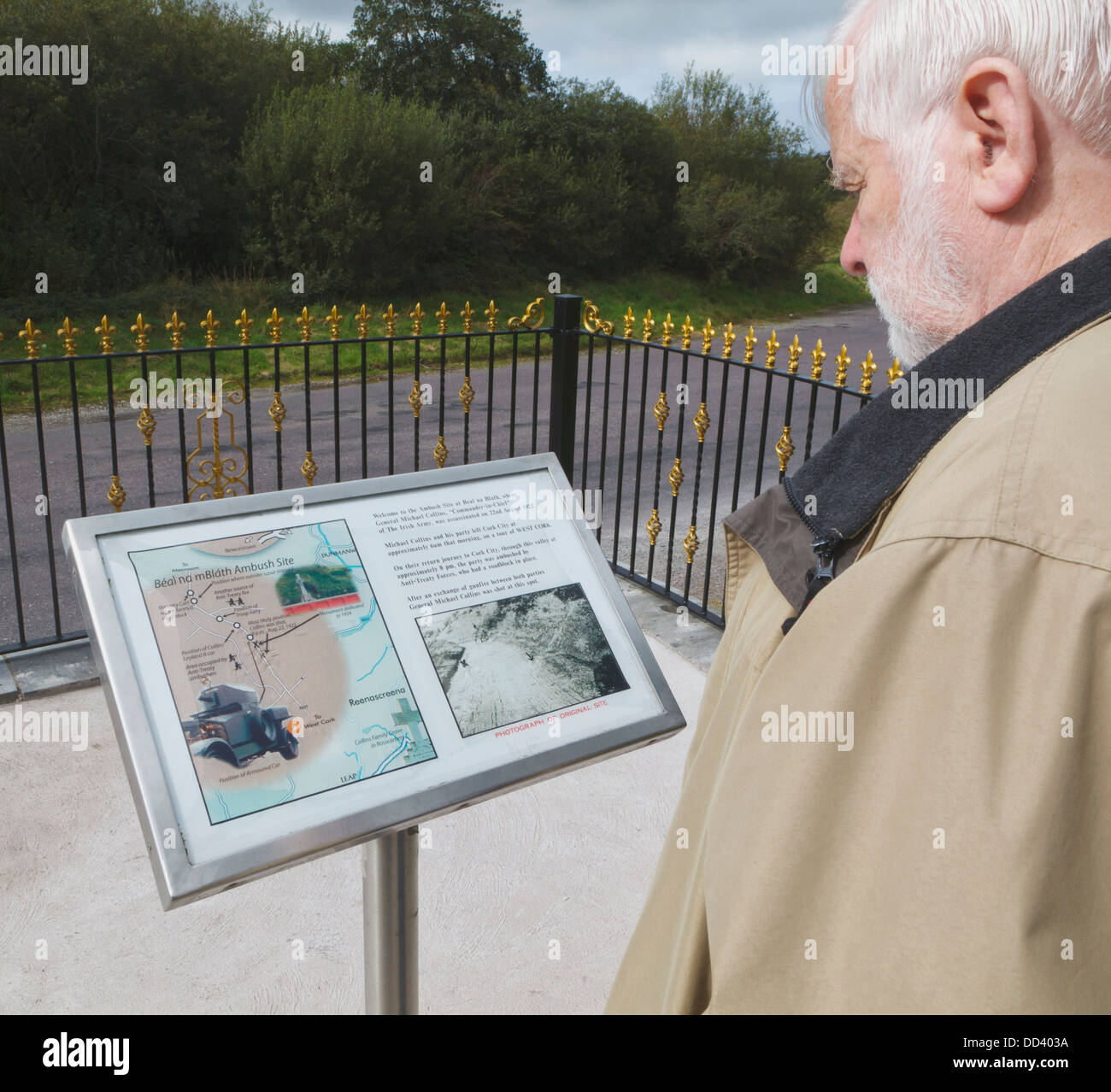 Man Reading Plaque At Roadside Memorial Of Ambush Site Where Michael ...