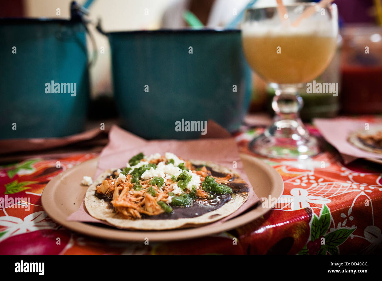 A market treat- the Oaxacan specialty, the mamela, served with chicken ...