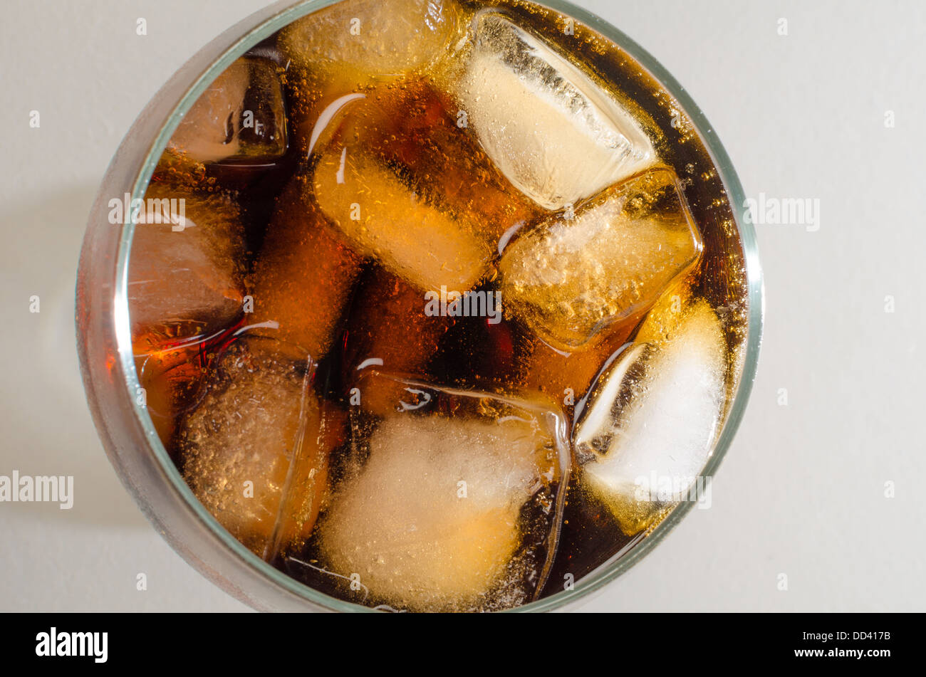 Coke soft drink with many ice cubes Stock Photo - Alamy