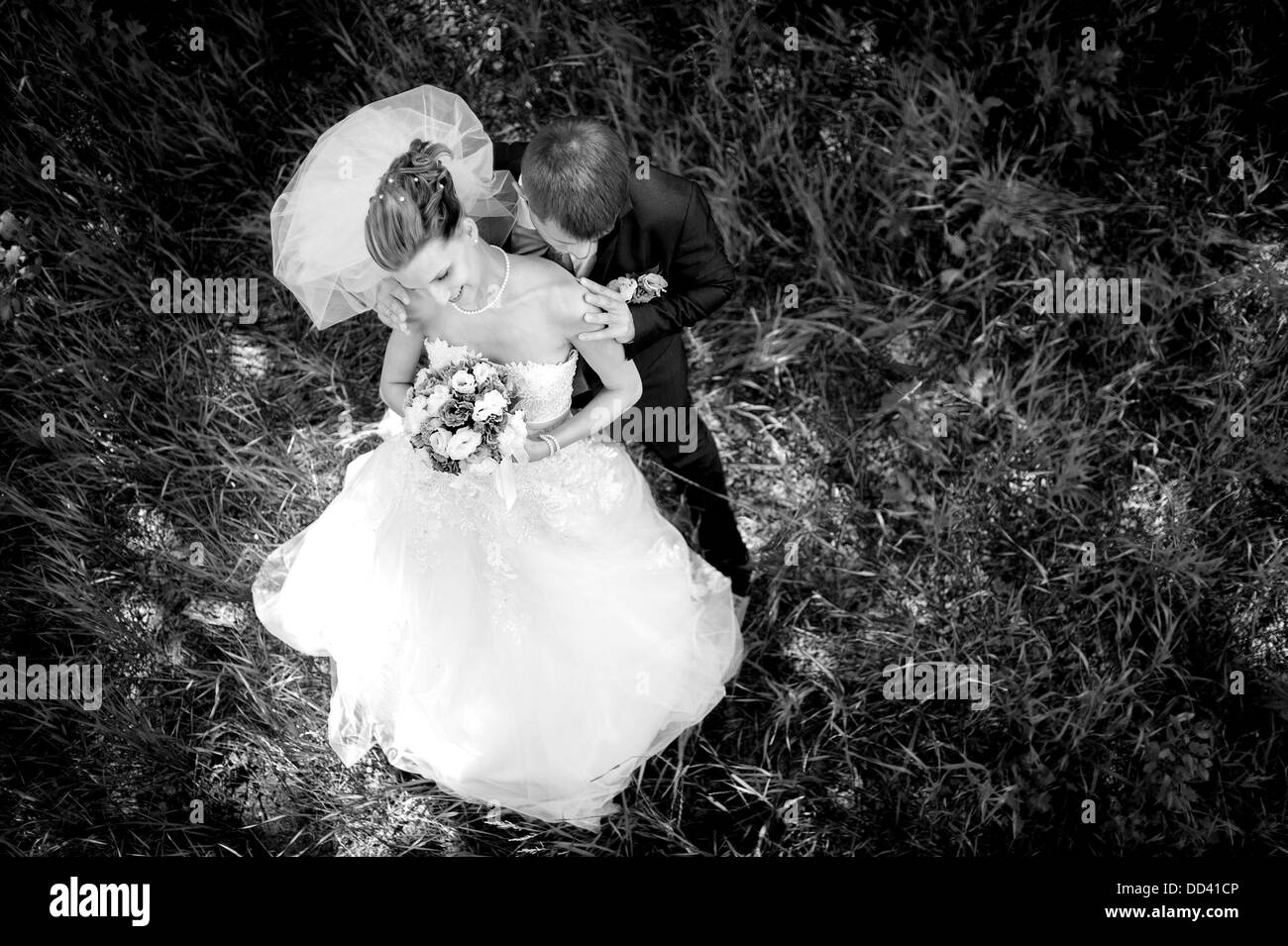 White groom black bride hi-res stock photography and images - Alamy
