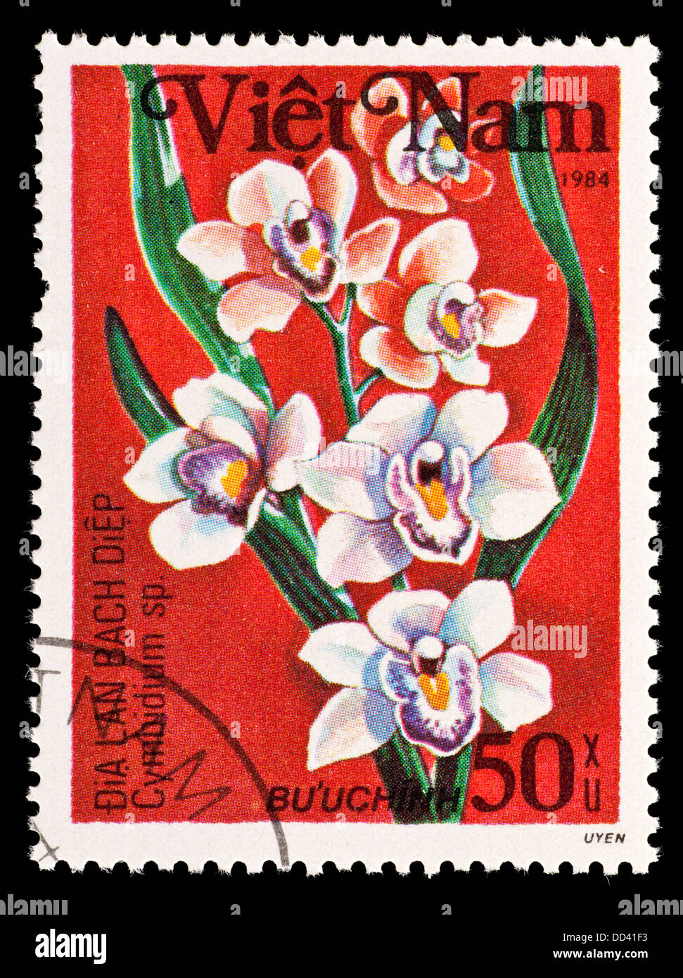 Postage stamp from Vietnam depicting a cymbidium orchid Stock Photo - Alamy