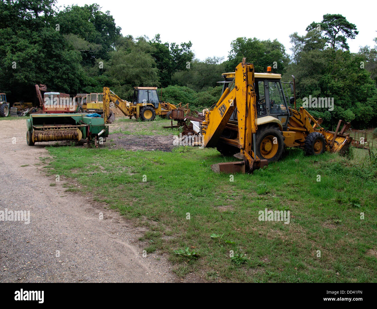 Old rusty diggers and farm equipment, UK 2013 Stock Photo - Alamy