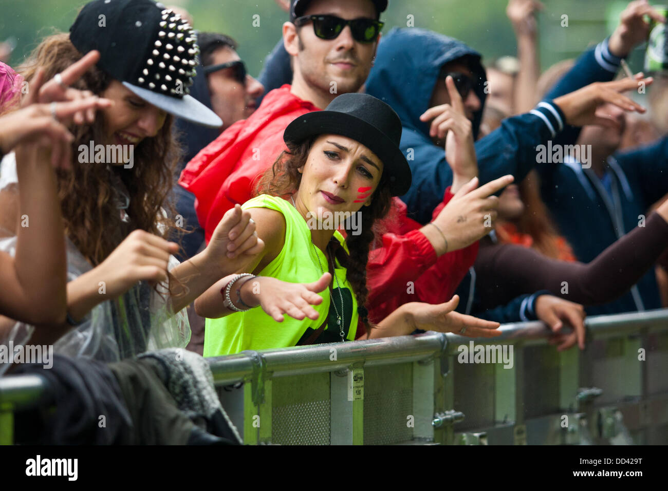 London, UK. 24th Aug, 2013. A festival goer pictured during day one of ...