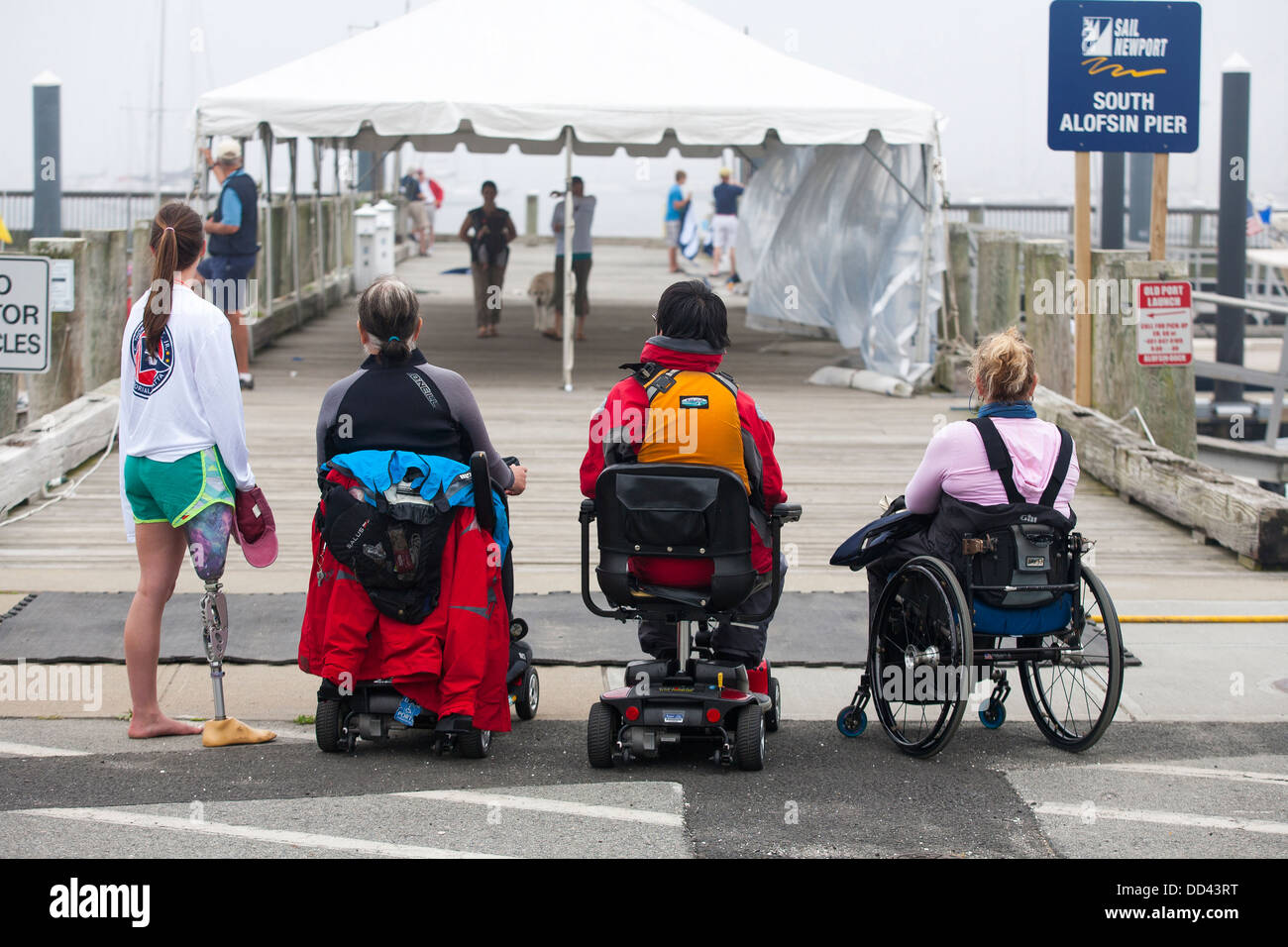 Disabled sailors and people with diasabilities congregate on the dock ...