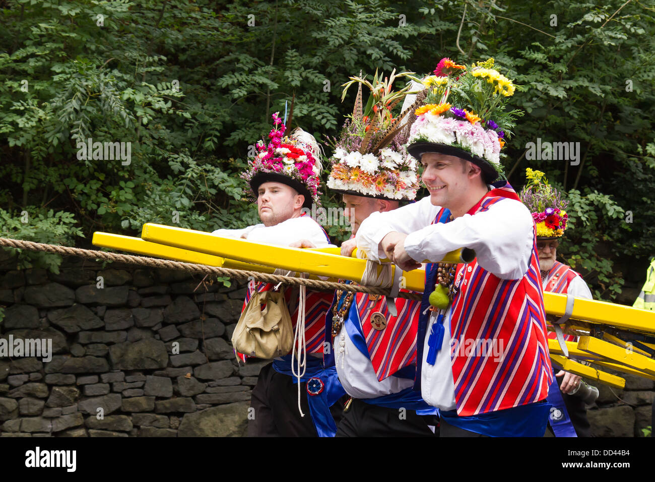 Morris dancers pulling the cart at the Saddleworth Rushcart 2013 Stock ...