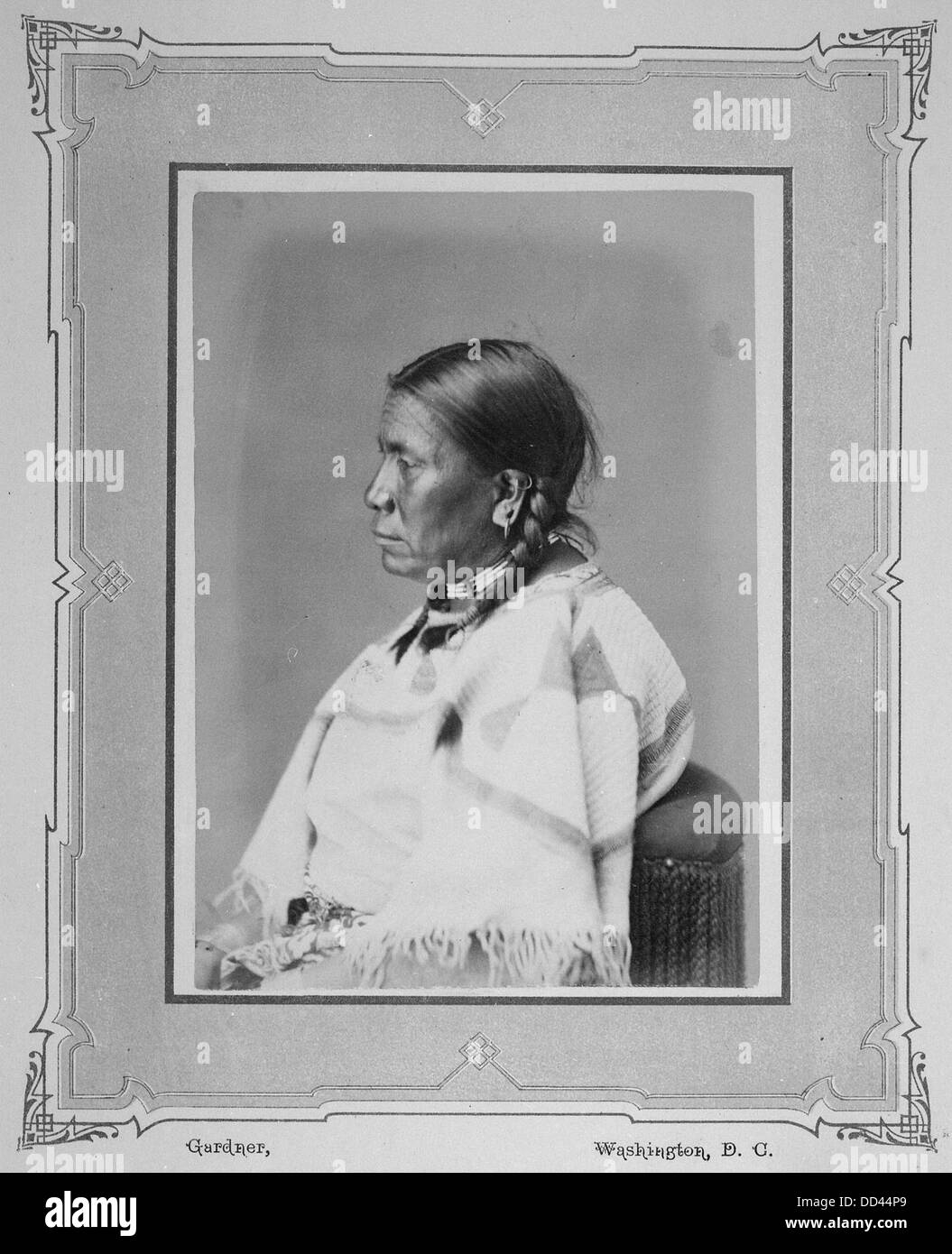 This historical image, from 1872, features Squaw of Thigh, a member of ...