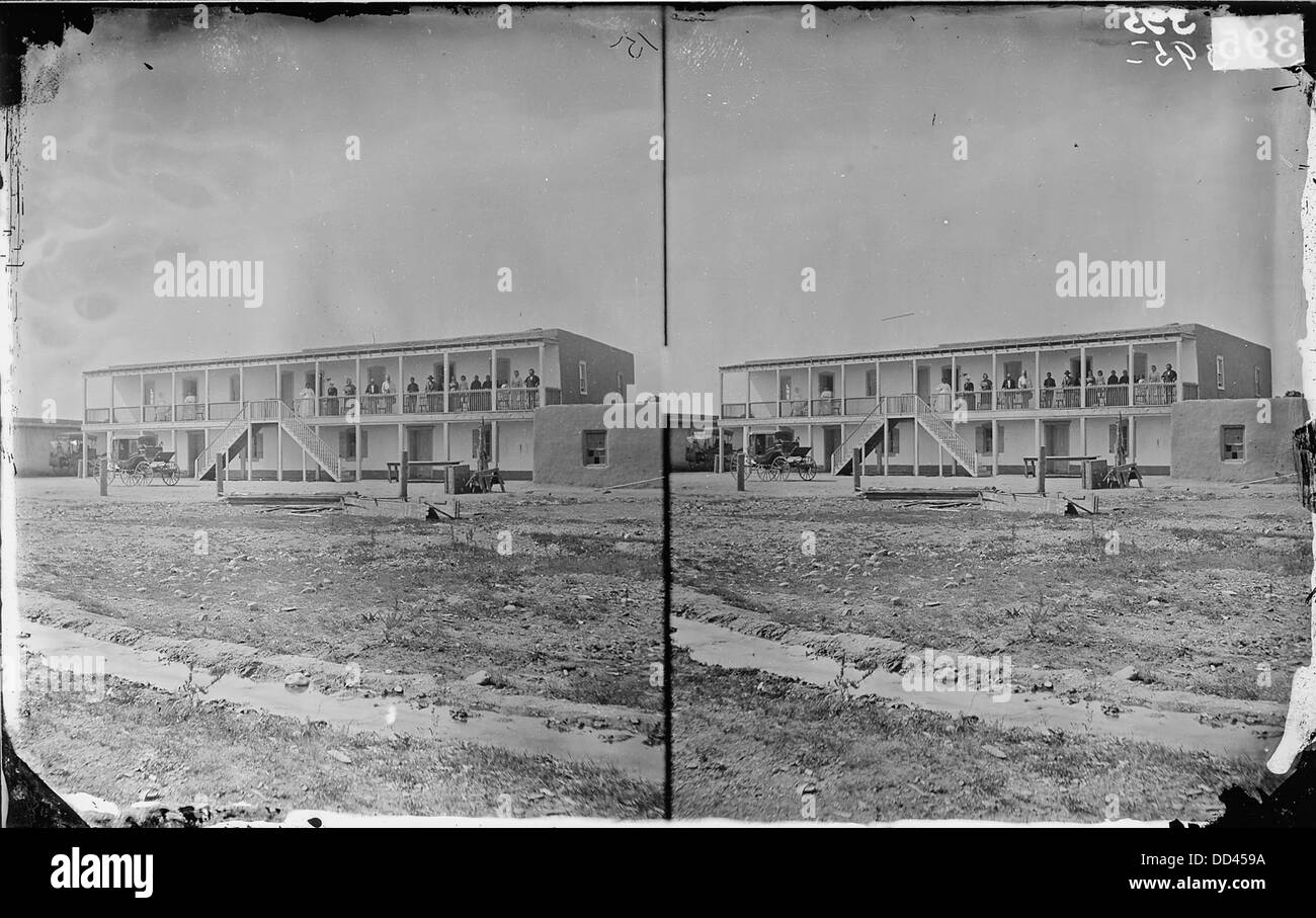 A two-story building is shown with people present, reflecting everyday ...