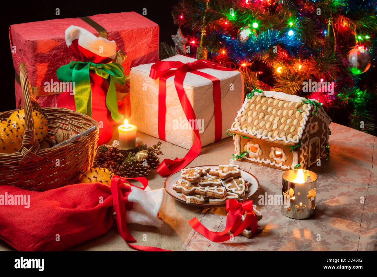 View of the Christmas table with presents and a Christmas tree Stock ...