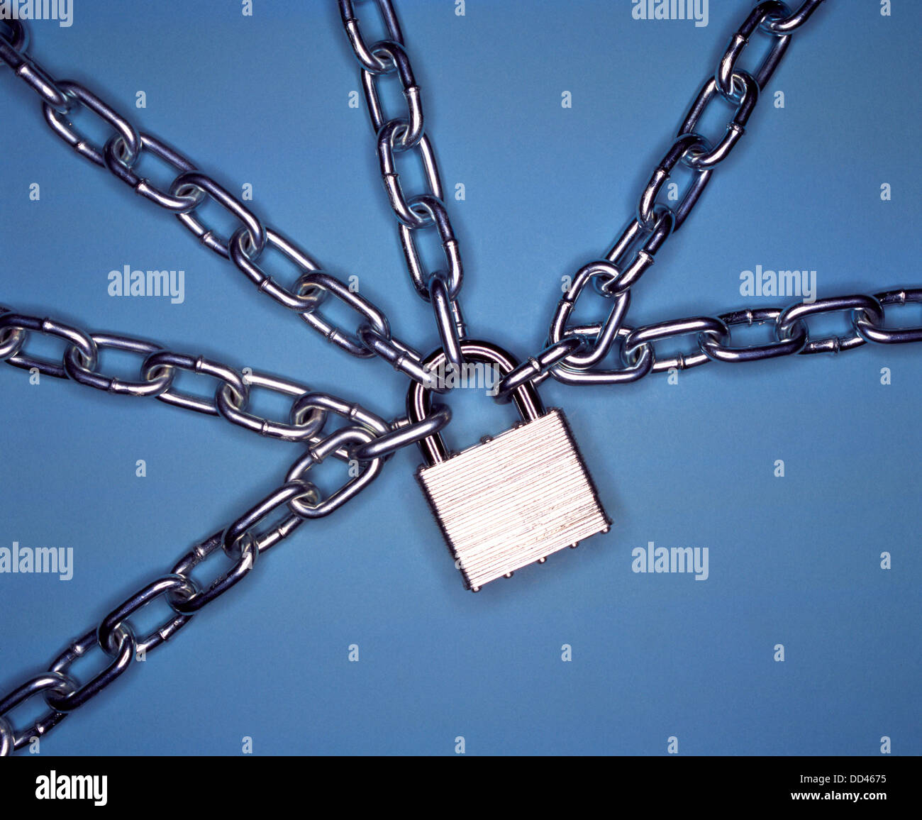 A metal padlock held by multiple metal chains. Blue background Stock ...