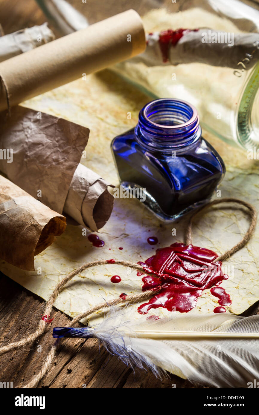 Vintage desk full of old scrolls scribe Stock Photo - Alamy