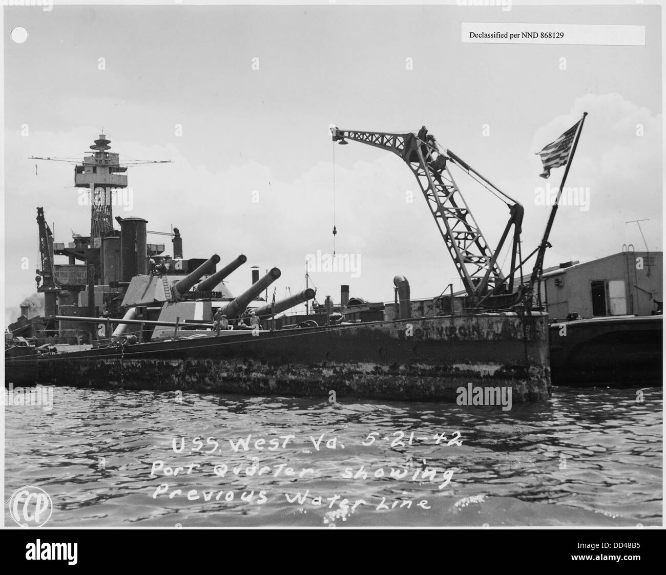 This photograph shows the USS West Virginia on May 21, 1942, after the ...