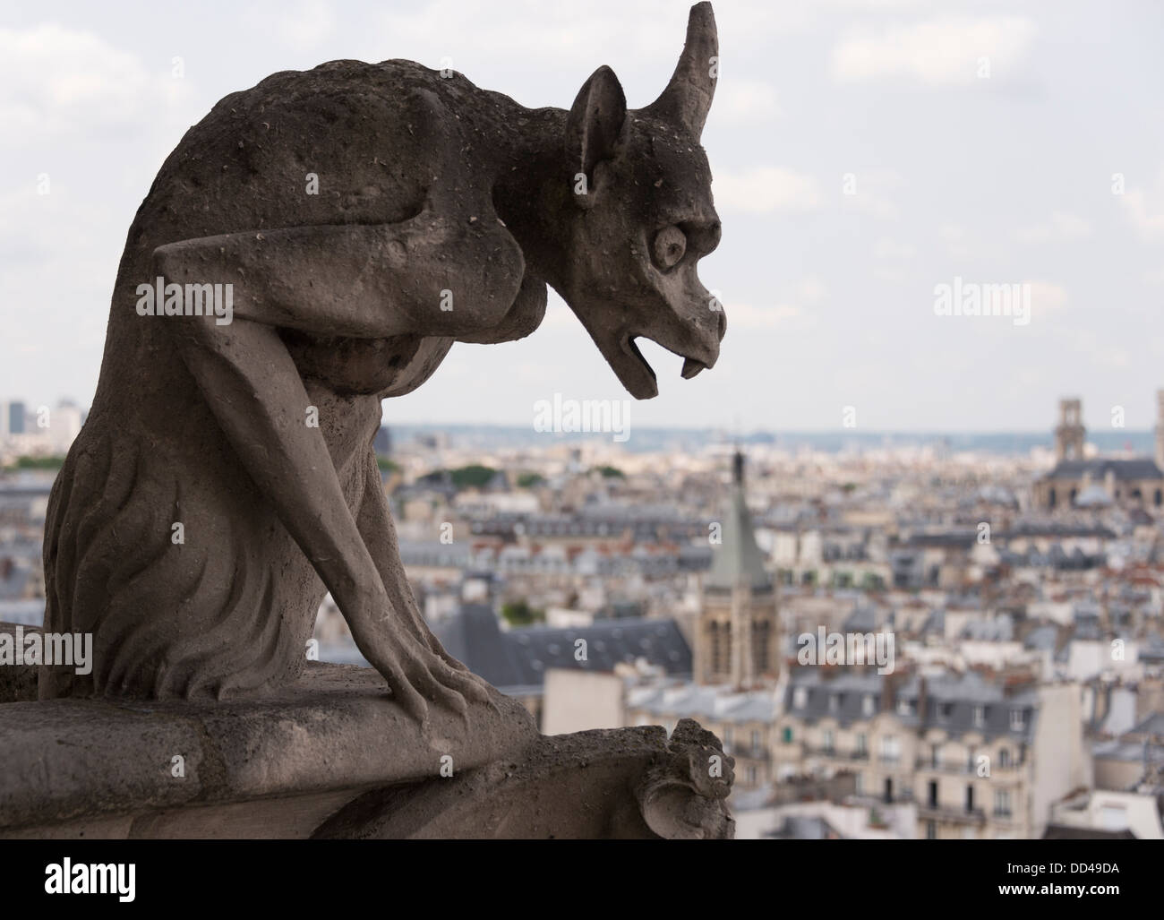 Gothic chimera on Paris' Notre Dame cathedral looks across the city ...