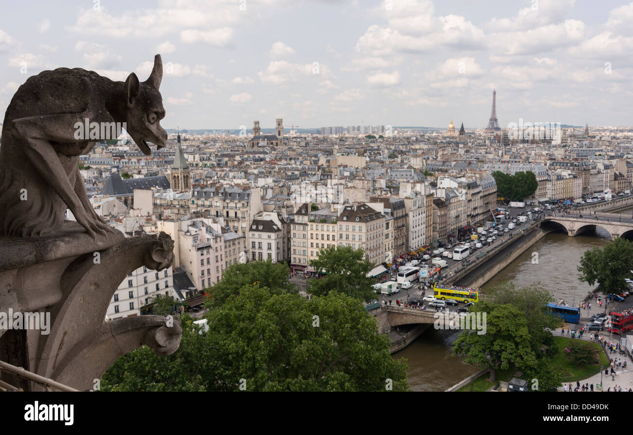 Gothic chimera on Paris' Notre Dame cathedral looks across the city ...