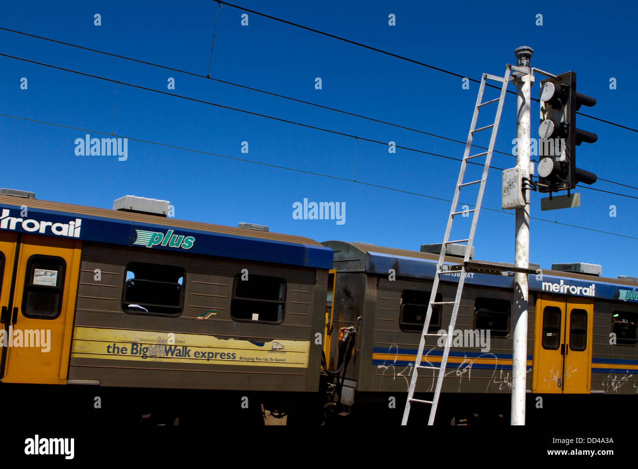 Metrorail train in Kalk Bay Stock Photo - Alamy