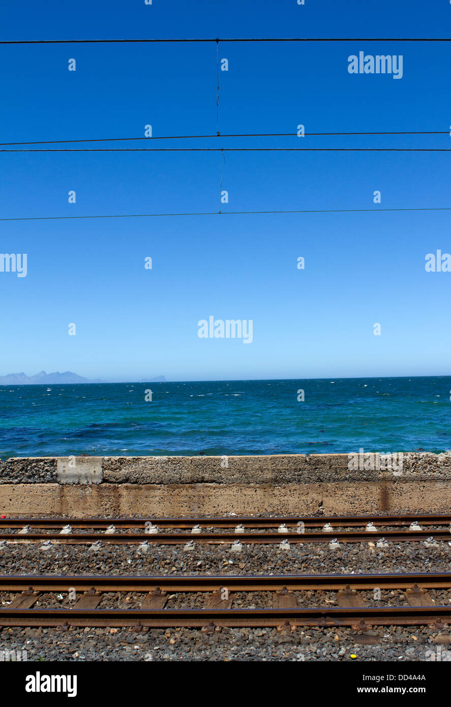 Train line by the sea Stock Photo - Alamy