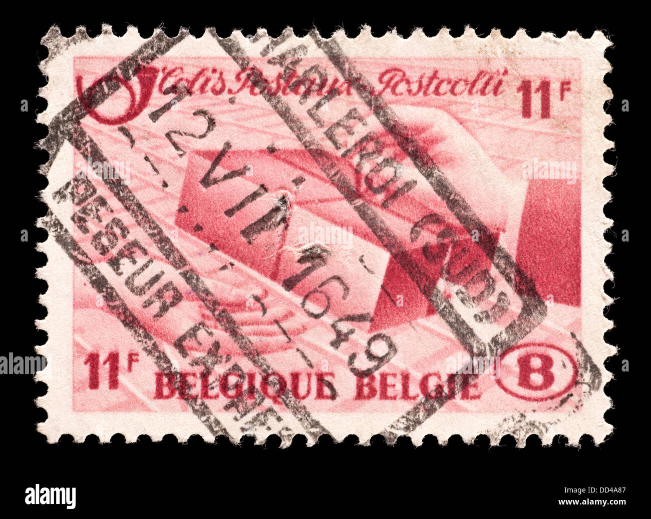 Postage stamp from Belgium depicting a man's hand with a package Stock ...
