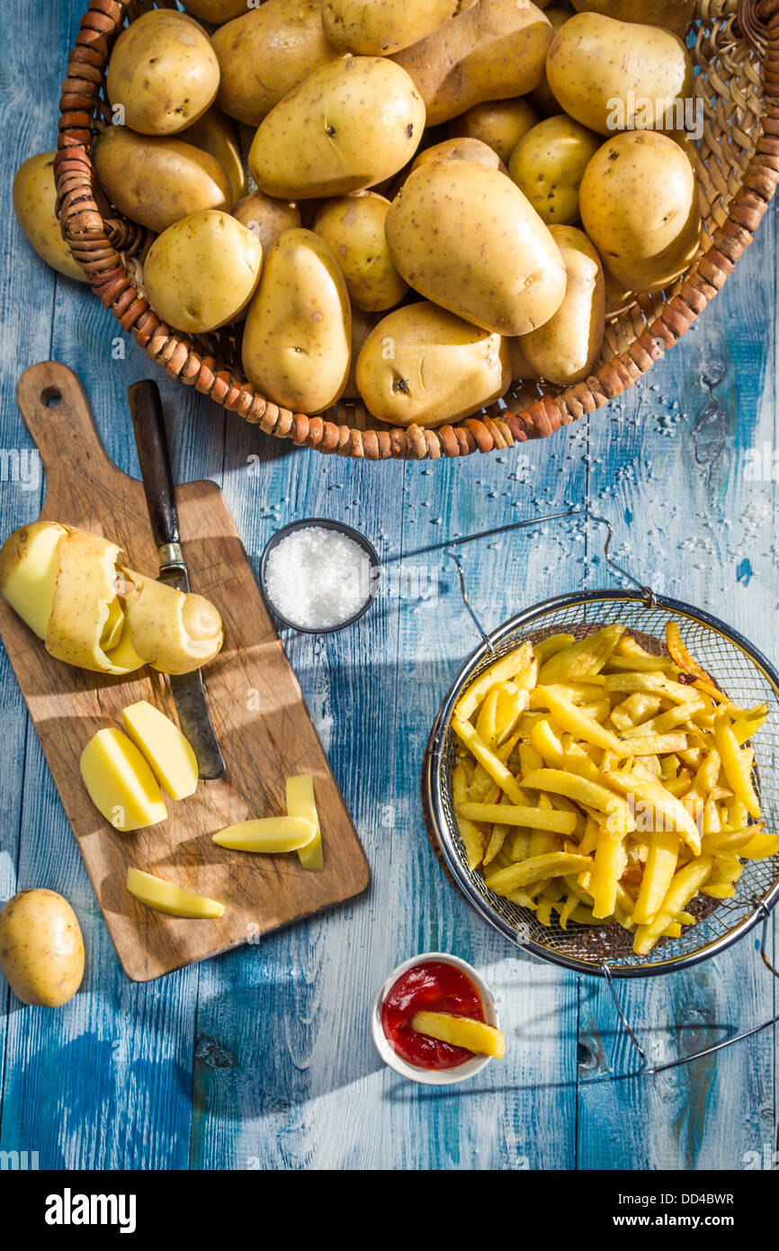 During the preparation of homemade fries Stock Photo - Alamy
