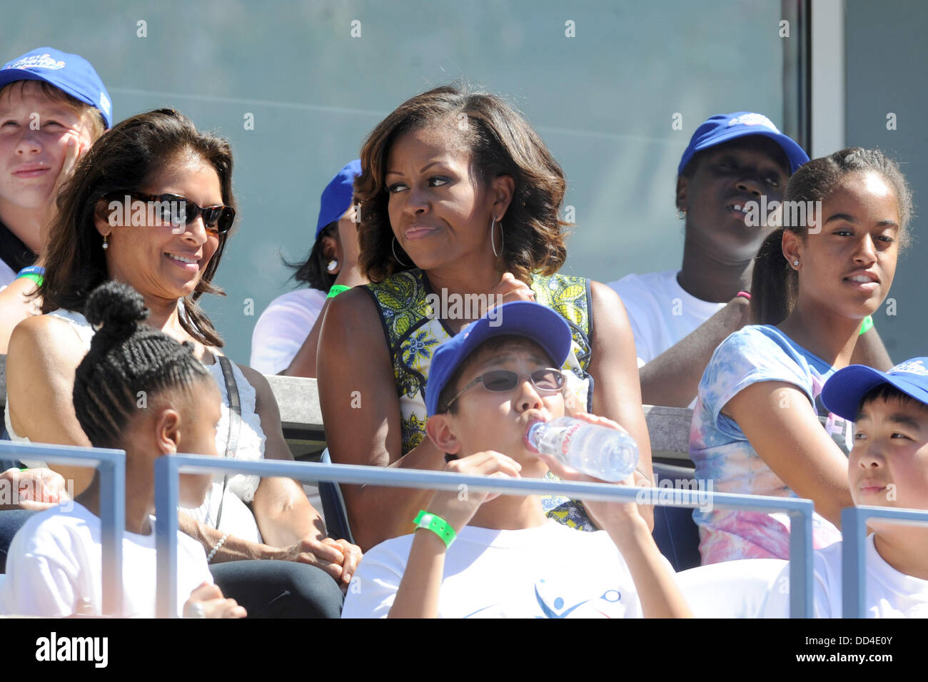 Jeanne Moutoussamy-Ashe, Michelle Obama and Sasha Obama attend the 2013 ...