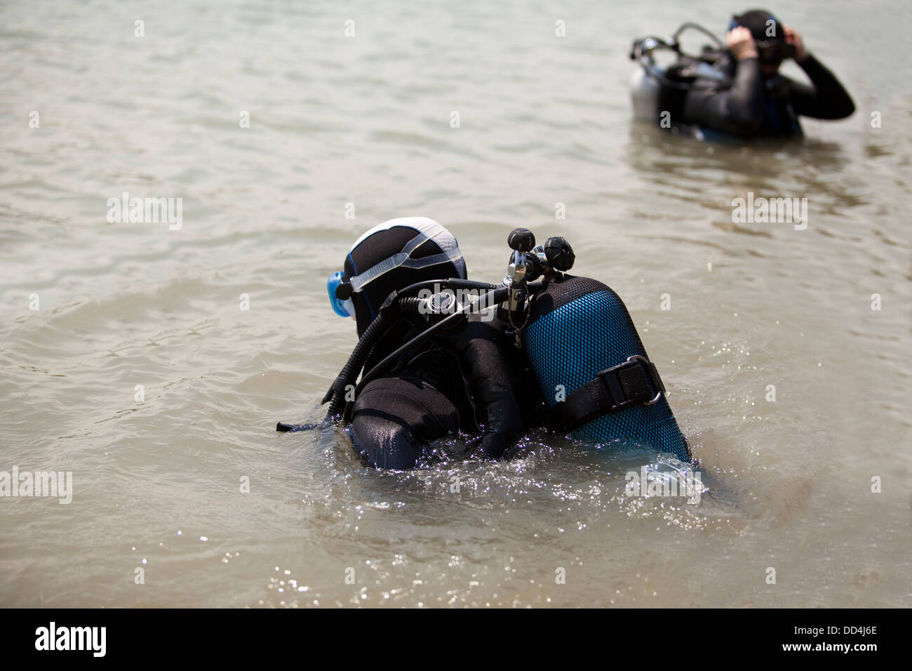 Scuba diver preparing diving gear hi-res stock photography and images ...