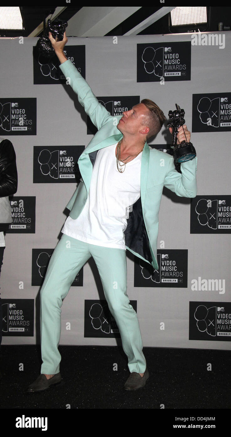 New York, New York, USA. 25th Aug, 2013. Rapper MACKLEMORE poses for ...