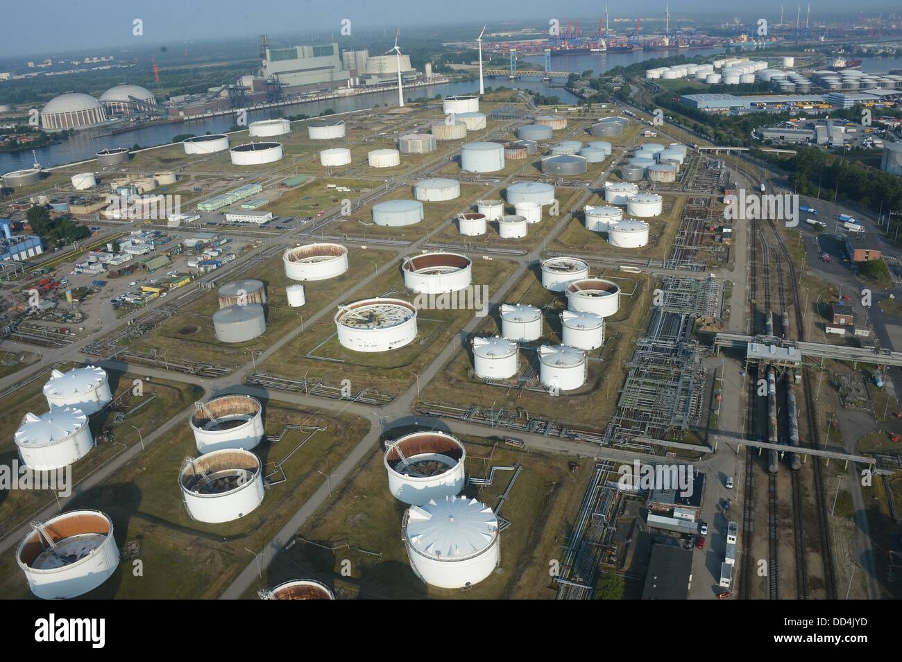 A refinery of Shell with giant oil tanks located on the premise is ...