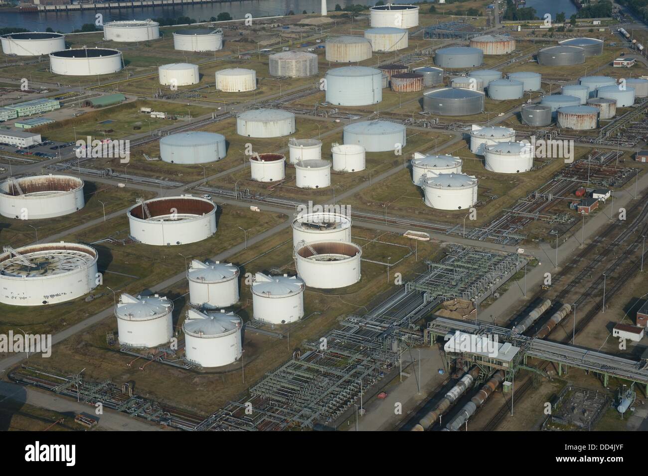 A refinery of Shell with giant oil tanks located on the premise is ...