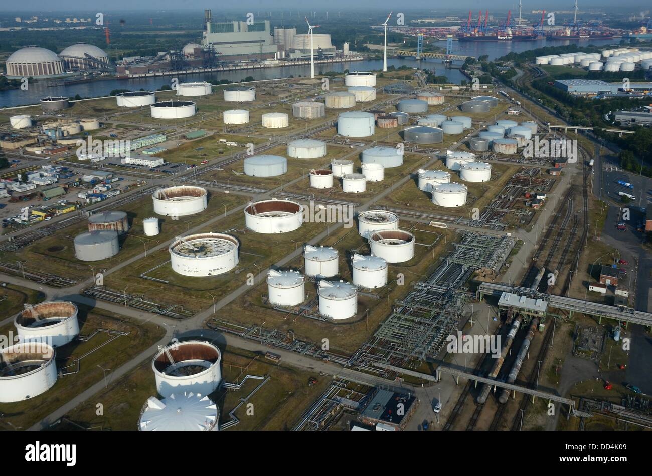 A refinery of Shell with giant oil tanks located on the premise is ...