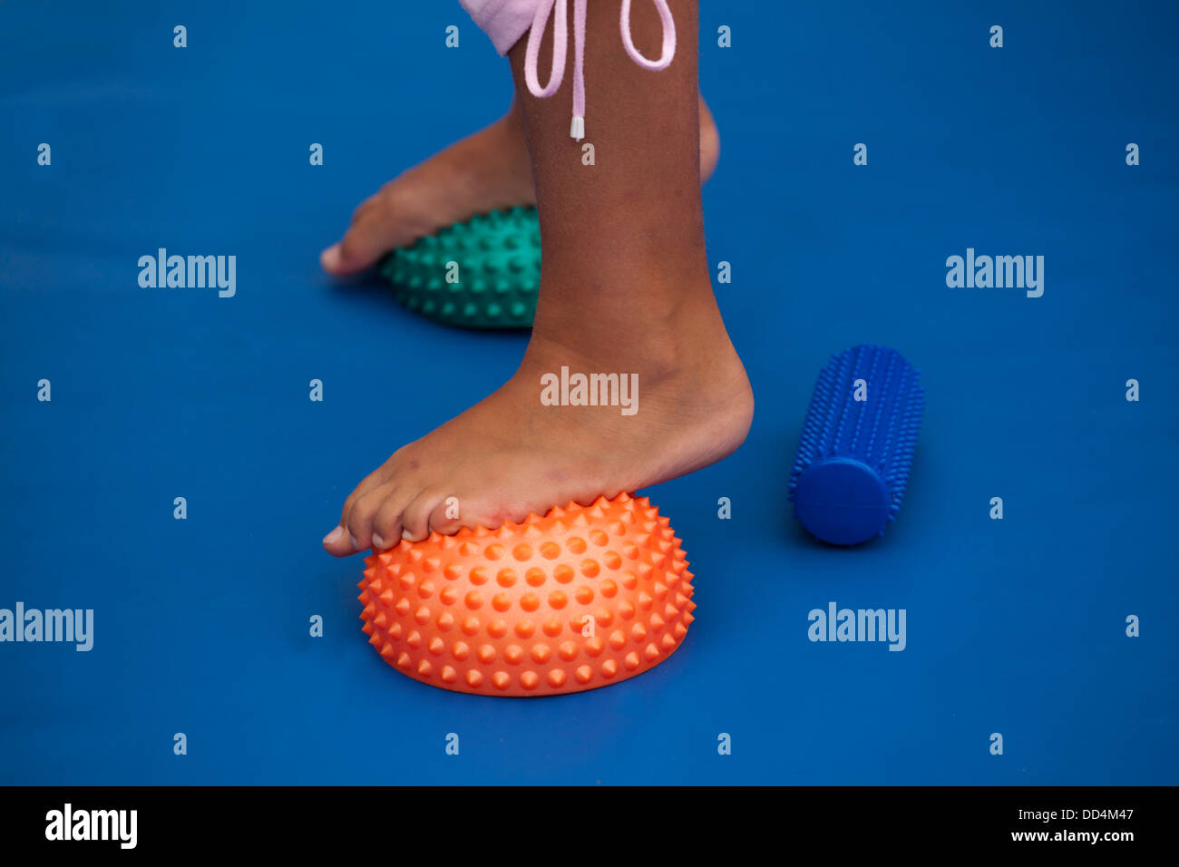 Massaging feet ball hi-res stock photography and images - Alamy