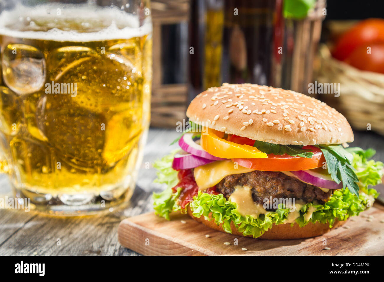 Closeup of homemade burger and a cold beer Stock Photo - Alamy