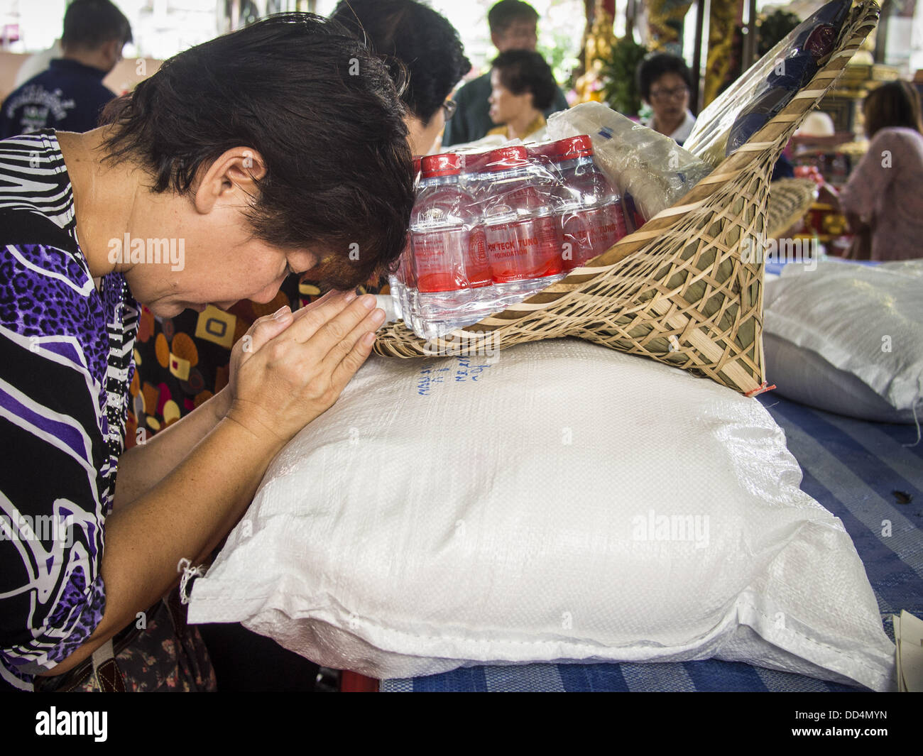 Donating rice hi-res stock photography and images - Alamy