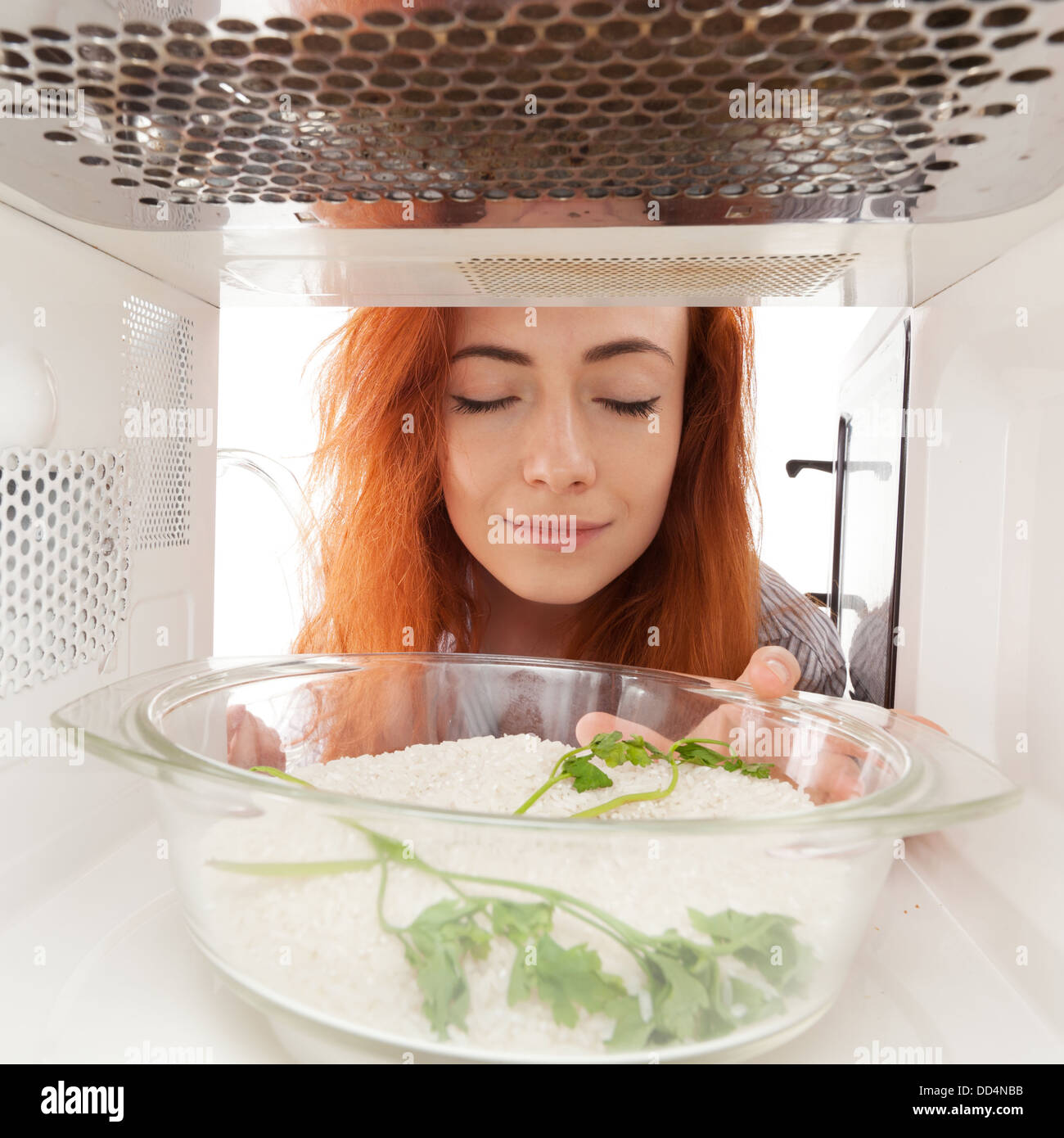 Attractive girl open microwave hi-res stock photography and images - Alamy