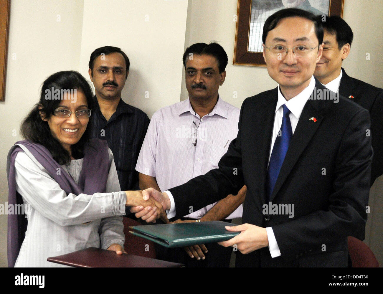 Islamabad, Pakistan. 26th Aug, 2013. secretary economic affairs division ms.nargis sethi and ...