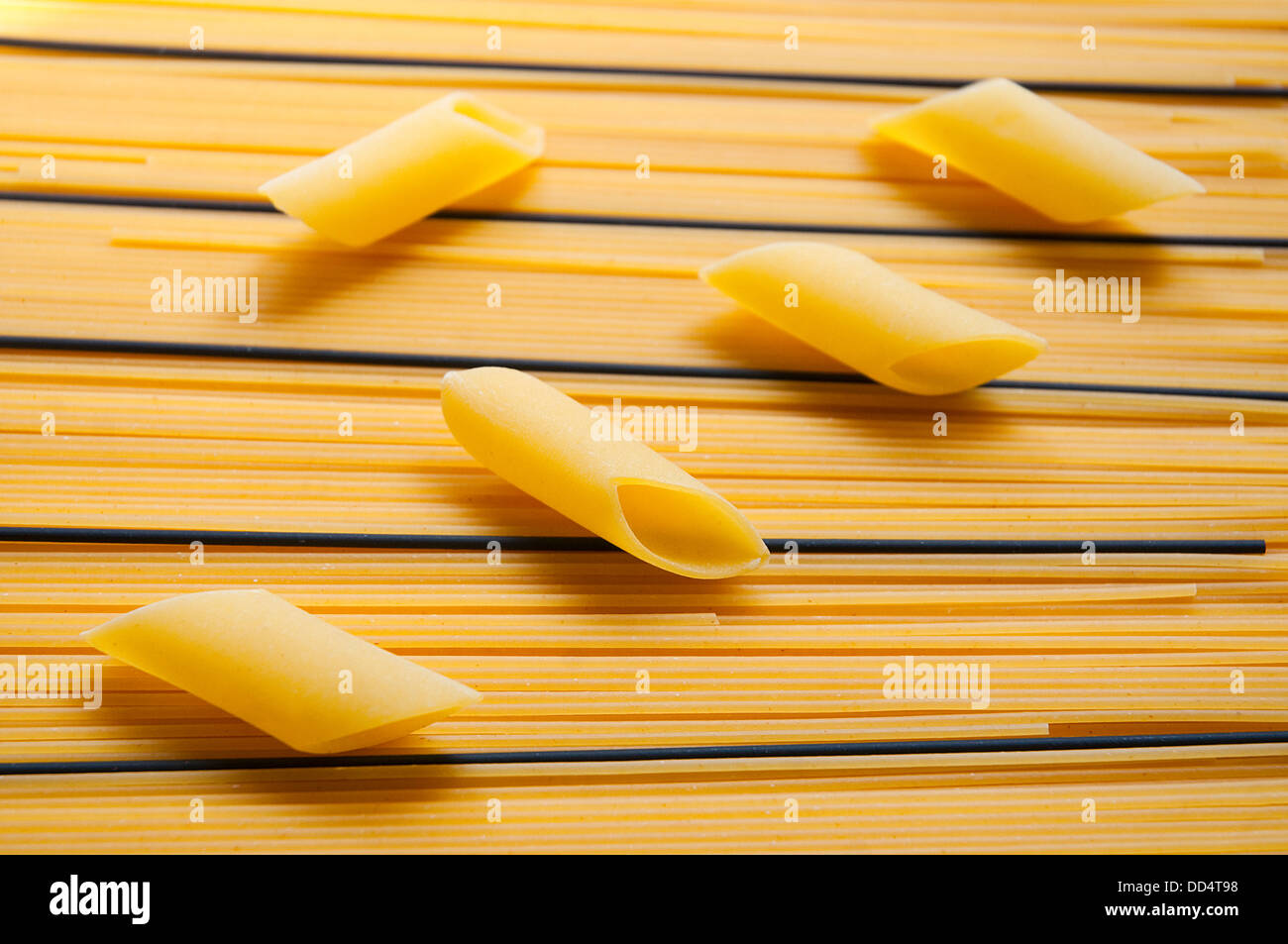 Pasta composition made of macaroni and spaghetti Stock Photo - Alamy