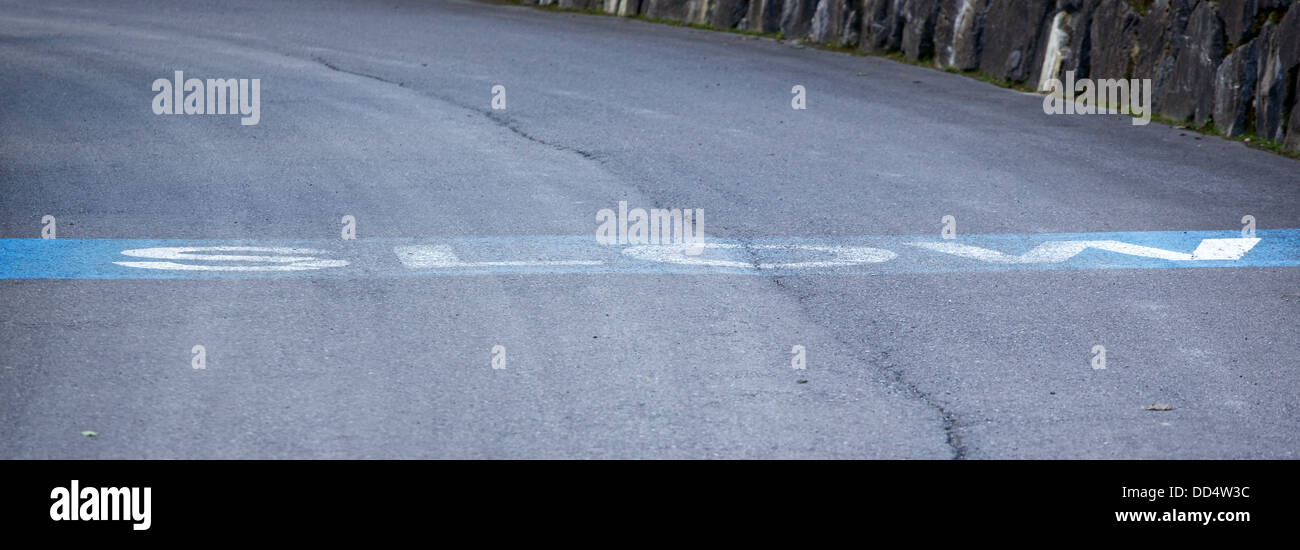 Slow signal at road entry Stock Photo - Alamy