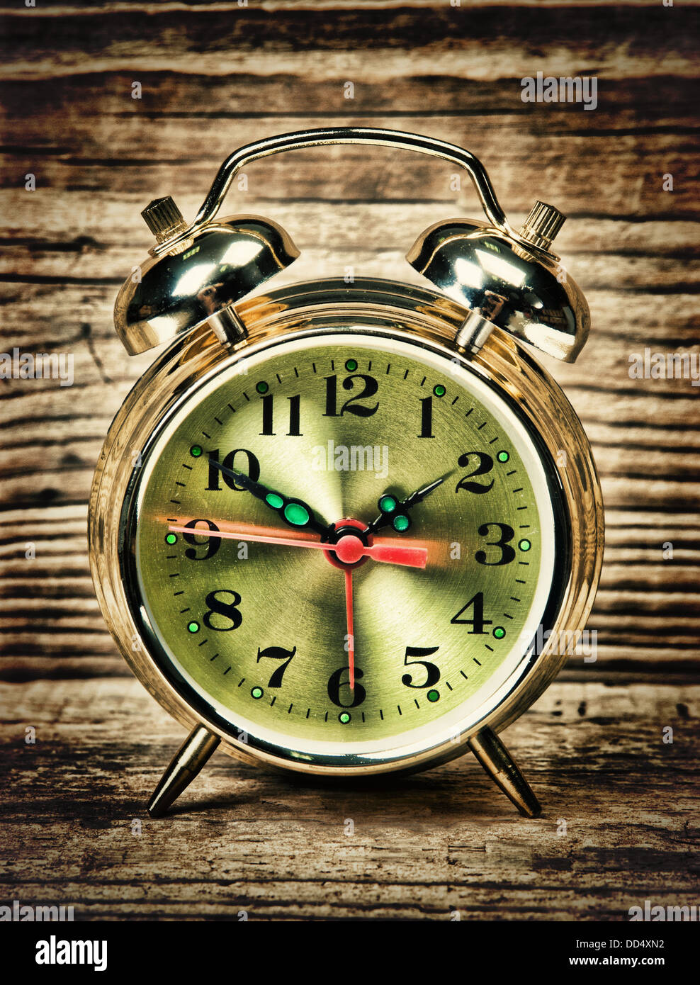 Golden alarm clock hi-res stock photography and images - Alamy