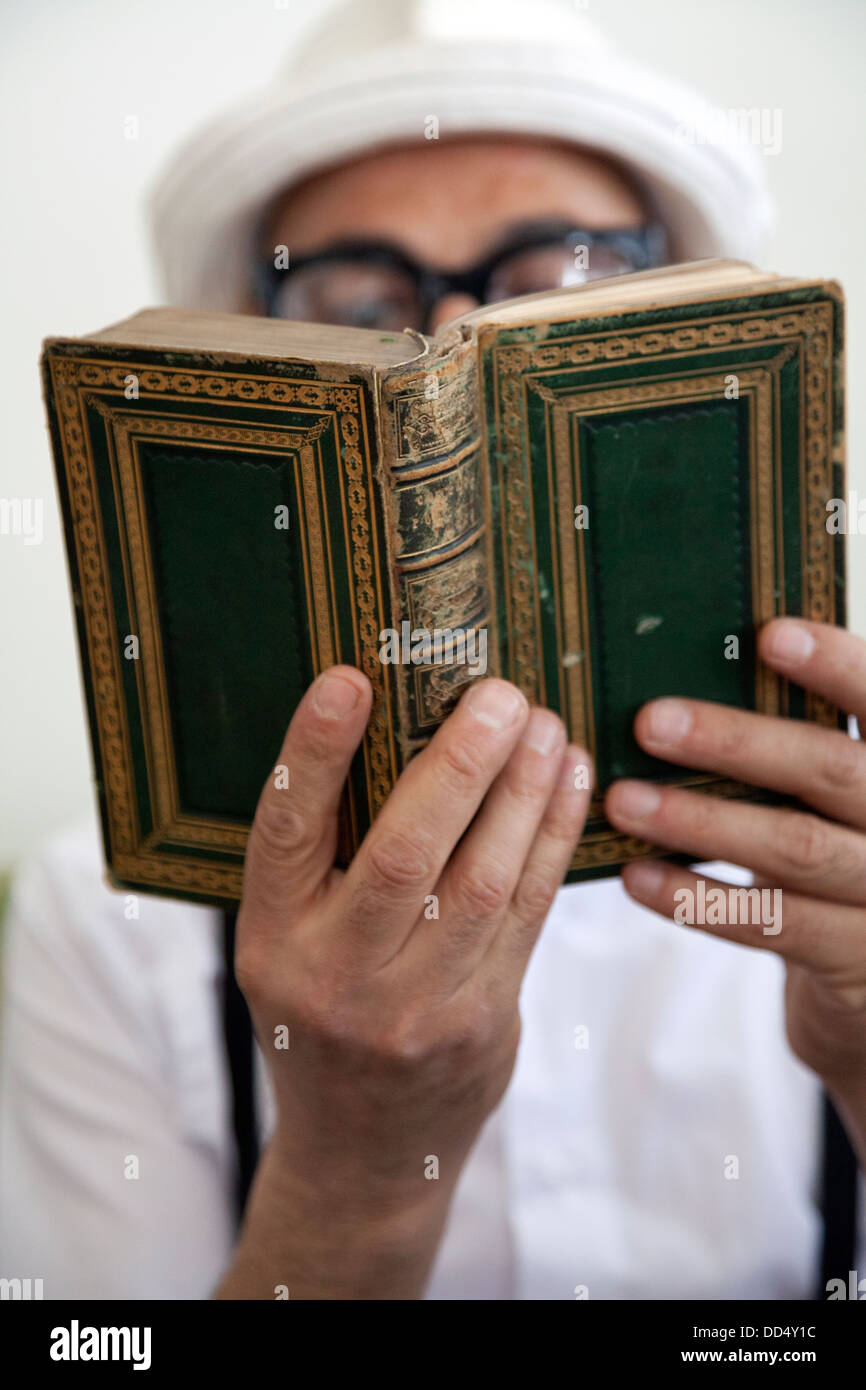 Man Reading Held Book Stock Photo - Alamy