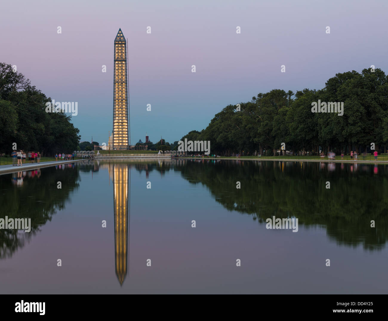 Washington Monument encased in illuminated scaffolding to repair damage ...