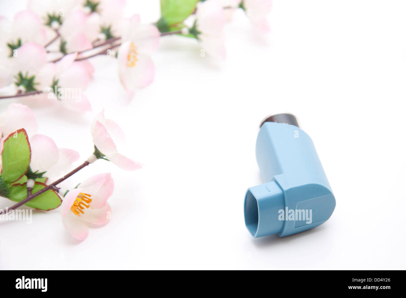 Asthma spray in the container Stock Photo - Alamy