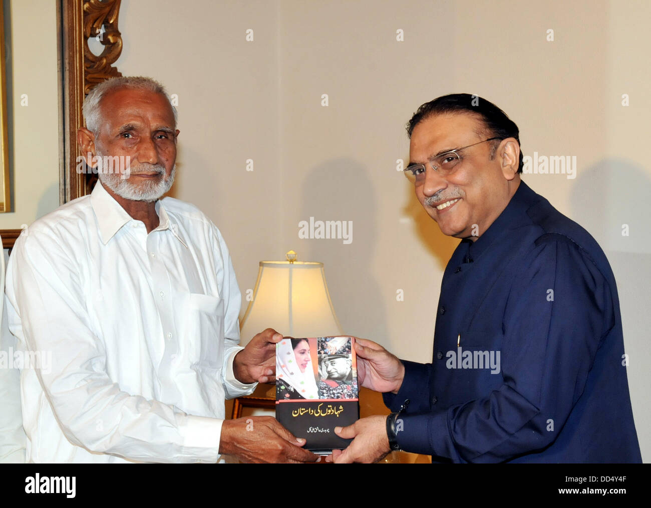 ISLAMABAD/ PAKISTAN . chaudhry ashiq ali gill presening his book to ...