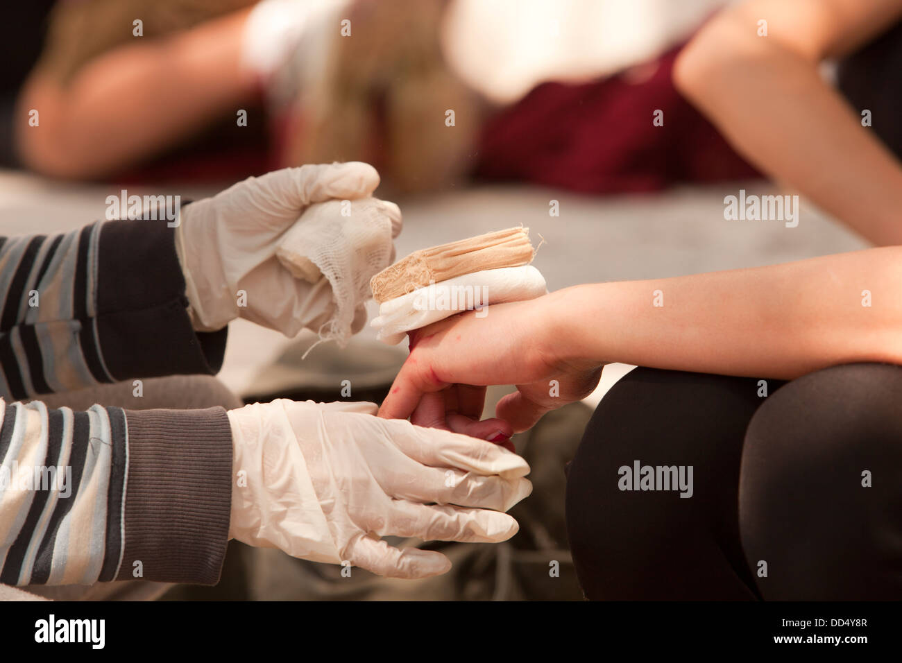 first aid training bandaging Stock Photo - Alamy