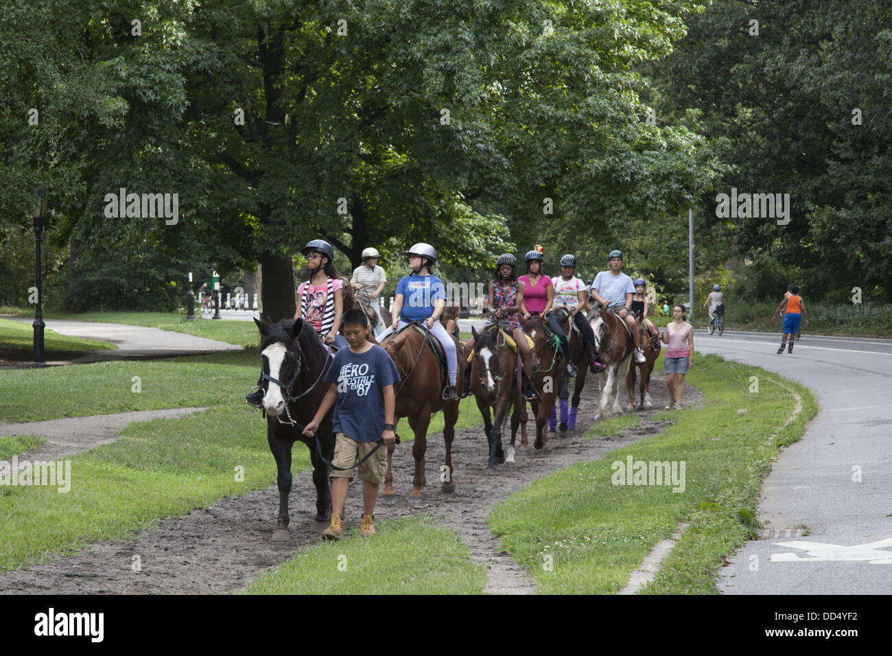 Group of teenage kids have a group horseback riding lesson in Prospect ...