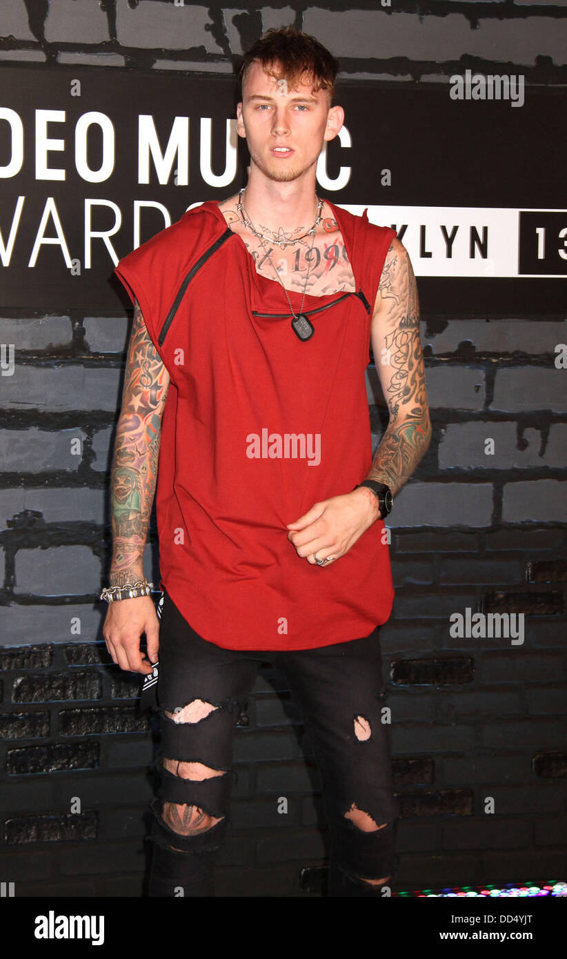 Mgk 2013 Machine Gun Kelly Debuts Fangs In Bold New Look: 'Might Need