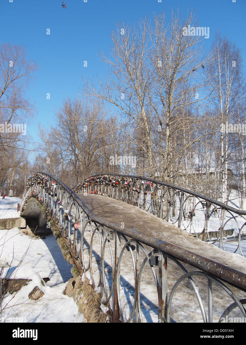 The bridge through the river in the winter Stock Photo - Alamy