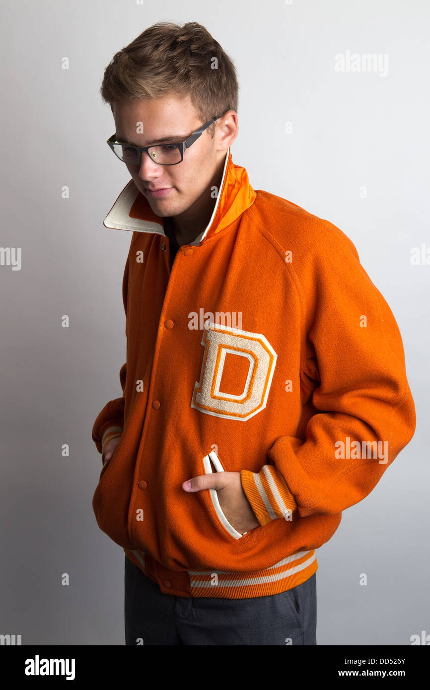 Teen in varsity red jacket Stock Photo - Alamy