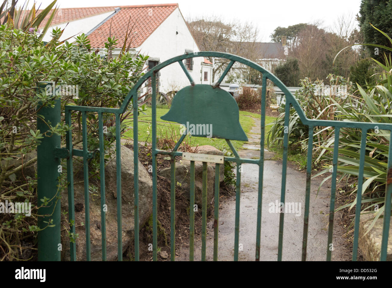 Guernsey 2013. German occupation museum. German helmet symbol on garden ...