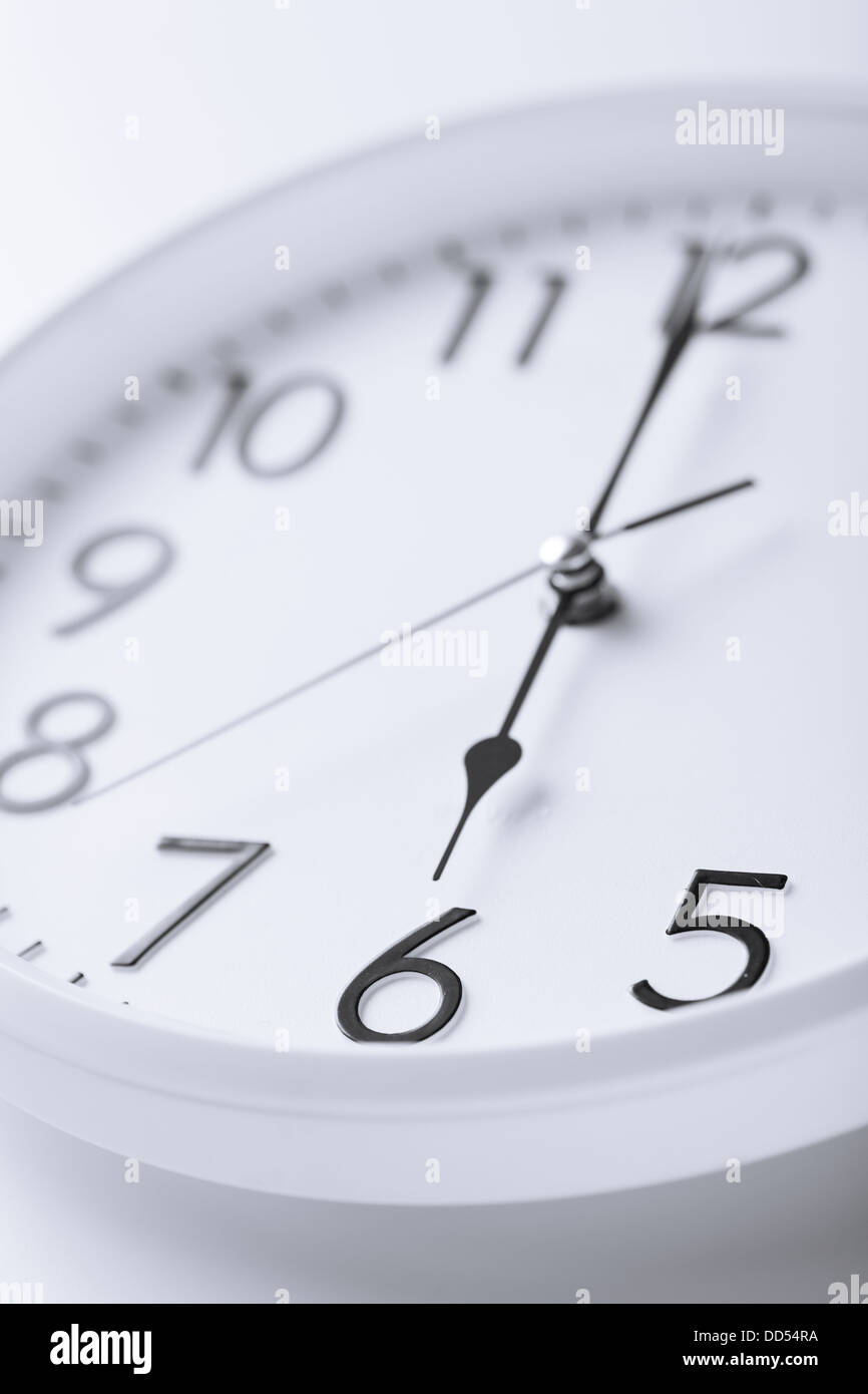 Wall clock showing time six hi-res stock photography and images - Alamy