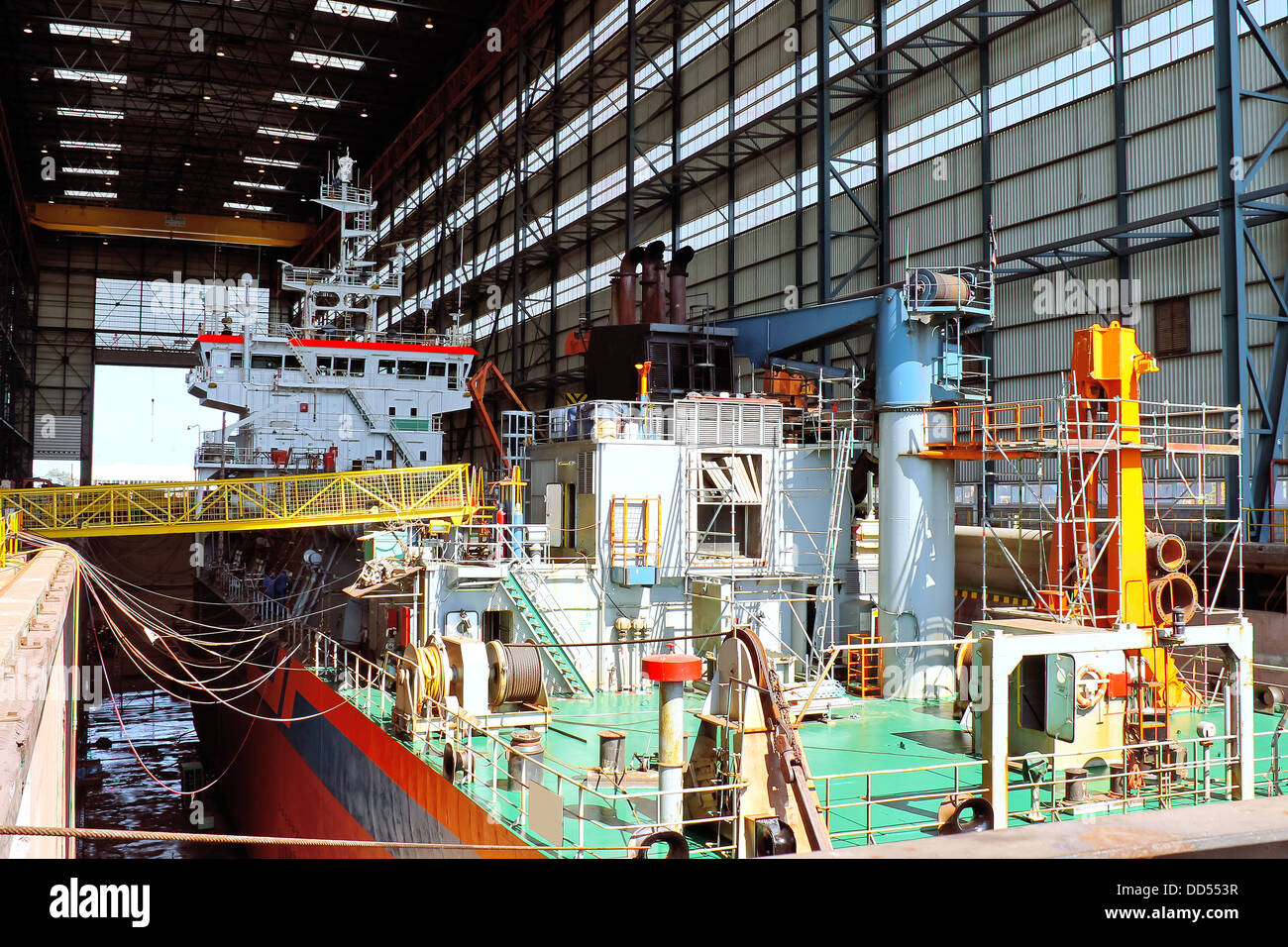 Ship in shipyard's covered dry dock Stock Photo - Alamy