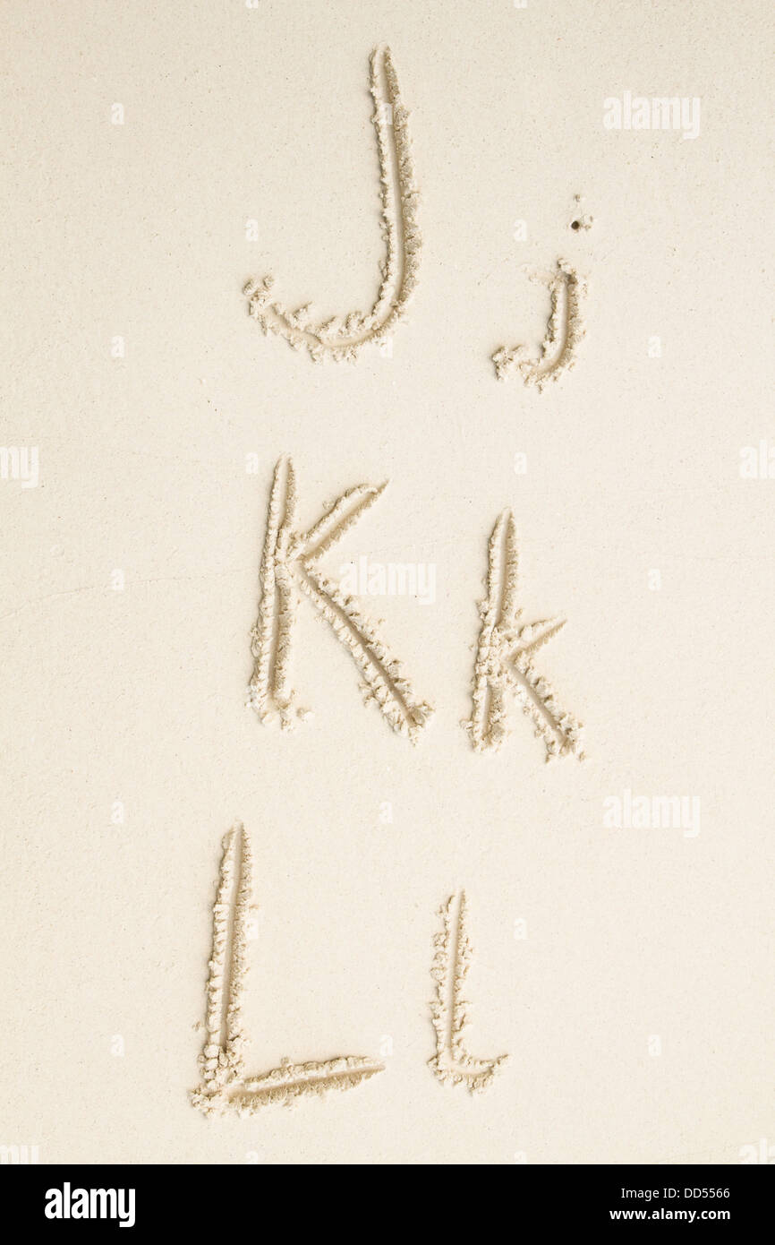 alphabet in sand Stock Photo - Alamy