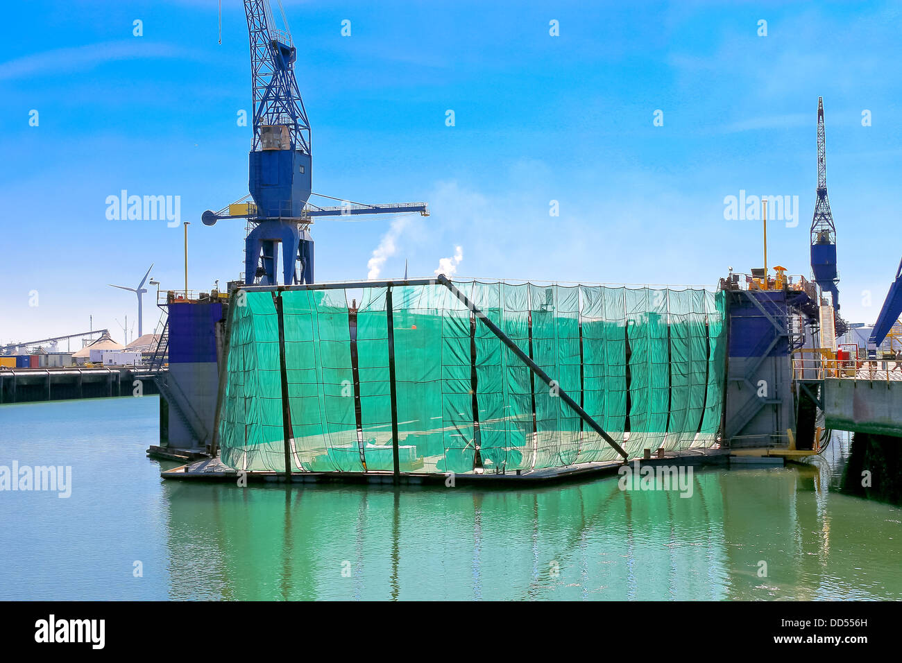Dry dock at the shipyard, protected network Stock Photo - Alamy