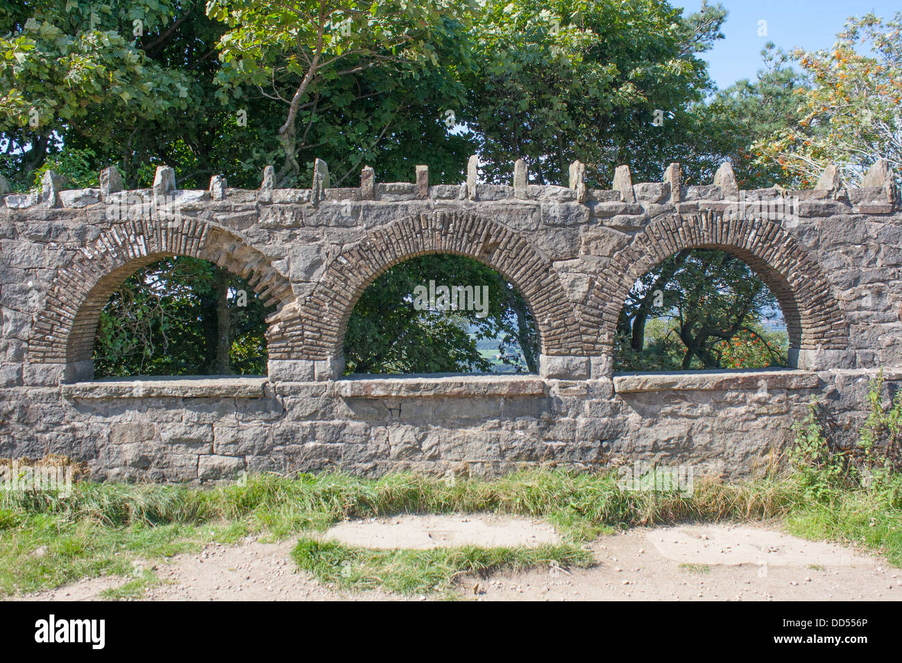 window arches on stone wall Stock Photo - Alamy
